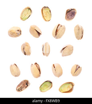 Single pistachio shell, with peeled green shell inside, isolated on ...