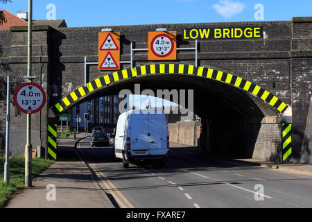 A signed low 4.0m headroom railway bridge in Market Harborough ...