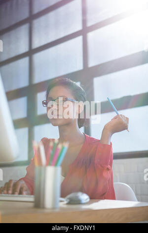 Woman working on computer in coffee shop, stock photo Stock Photo - Alamy
