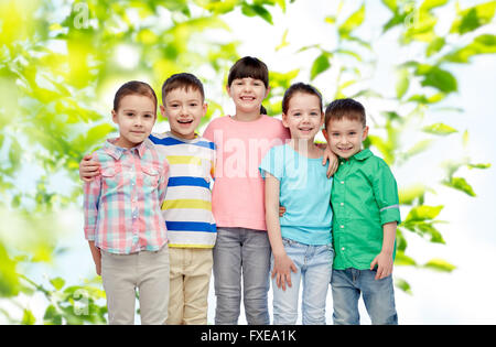 happy smiling little children hugging Stock Photo - Alamy