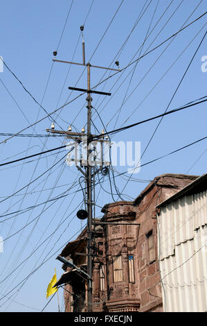 Indian electricity power cables in the high street of Puttaparthi ...
