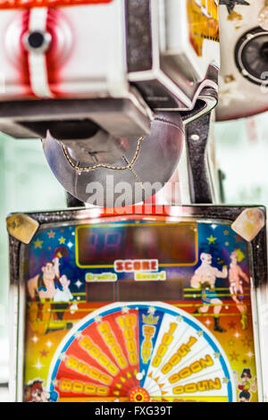 fun fair punch ball machine Stock Photo - Alamy