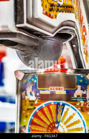 fun fair punch ball machine Stock Photo - Alamy