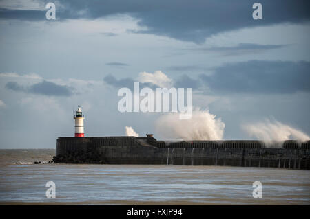 Waves crashing over lighthouse during storm Stock Photo - Alamy