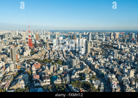 Tokyo tower and high rise buildings at night in Tokyo, Japan Stock ...