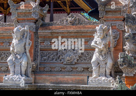 Traditional balinese stone carving, wall in temple Stock Photo - Alamy