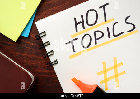 HOT word written on wooden blocks and placed on a yellow. Vacancy, sale ...