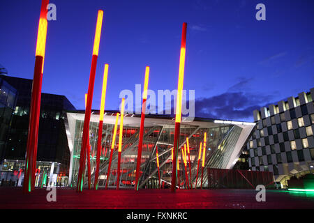Bord Gais Theatre and red sticks on Grand Canal Square in docklands at ...
