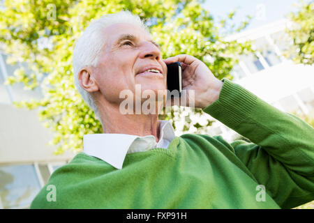 Man calling someone Stock Photo - Alamy