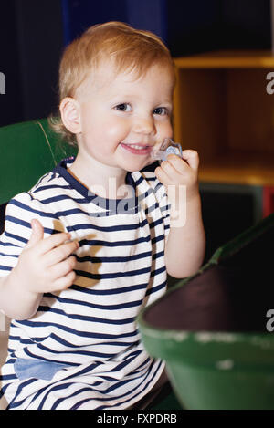 Baby (6-12 months) with pacifier smiling close up Stock Photo - Alamy