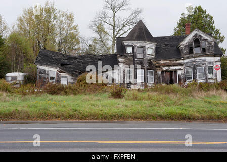 Warning sign for a haunted house Stock Photo - Alamy