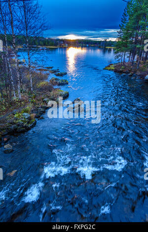 Sunset across Lake Inari at Nellim Stock Photo - Alamy