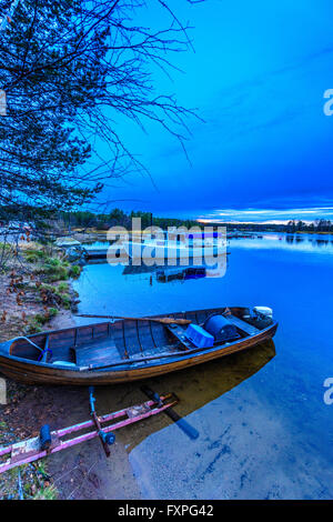 Sunset across Lake Inari at Nellim Stock Photo - Alamy