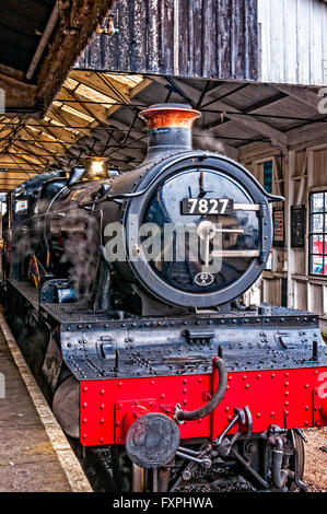 The restored passenger train Lydham Manor gleams as it hauls coaches ...