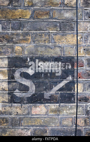 Faded World War II sign showing location of public air raid shelters ...