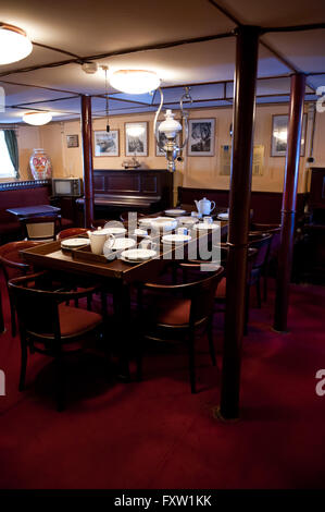 Wardroom mess cabin in Dar Pomorza ship, room interior at the sailing ...