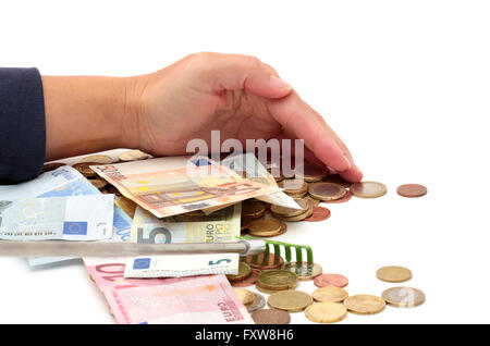 Greed for money. Hands grabbing coins Stock Photo - Alamy