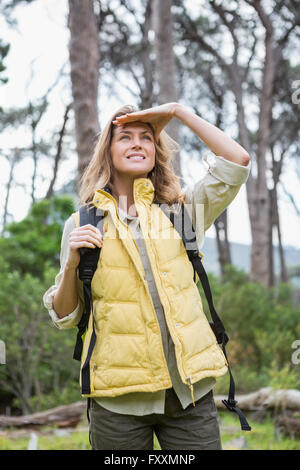 Woman observing something Stock Photo - Alamy