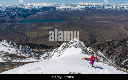 Ski mountaineer ascending to the summit of the "Super Gully" on Lost ...