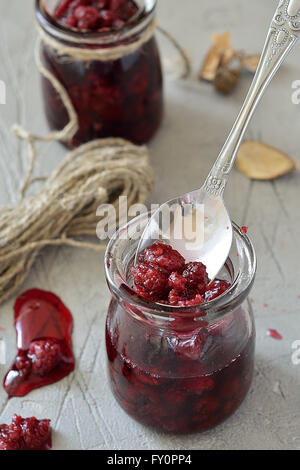 Tasty jam in banks on table close-up Stock Photo - Alamy