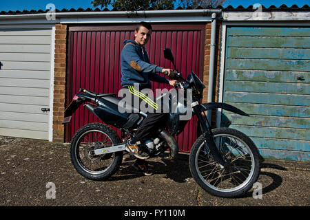 Model released image of a teenage boy to riding a motorbike Stock Photo ...