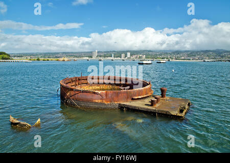 The remains of the USS Arizona in Pearl Harbor Oahu Hawaii peers out ...
