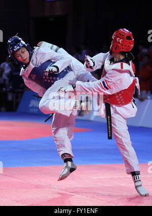 Pauline Lopez of the Philippines competes against Aliza Chhoeung of ...