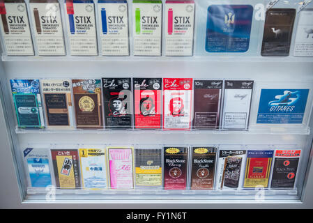 Cigarette kiosk shop in Japan with a variety of colors of many brands ...