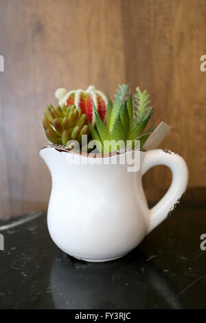 Fake flowers in flower pots for decoration Stock Photo - Alamy