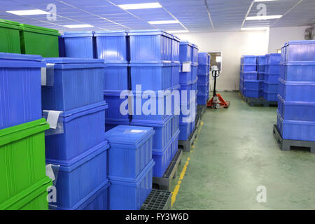 The blue Plastic box products in Industrial factory Stock Photo - Alamy
