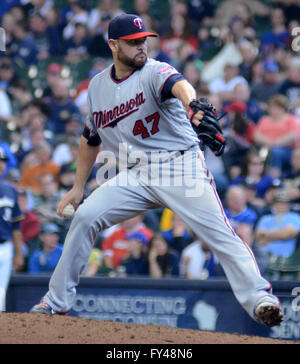 Minnesota Twins starting pitcher Ricky Nolasco, left, bumps fists with ...