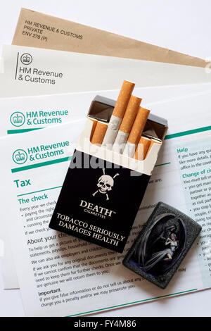 packet of death brand cigarettes and zippo lighter Stock Photo - Alamy