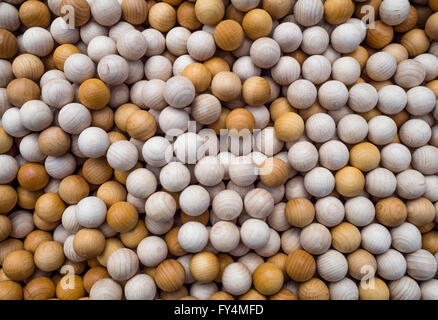 View from above onto many wooden balls of different texture and color ...