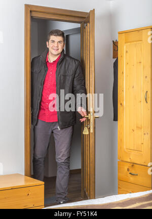Hotel guest entering room Stock Photo - Alamy