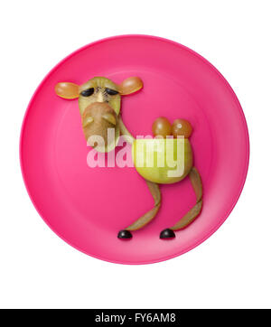 Camel made with fruits on plate and desk Stock Photo - Alamy