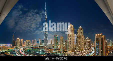 The tallest building Burj Khalifa surrounded by other modern skyscraper ...