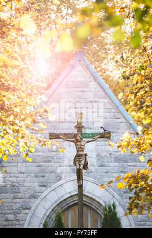 old crucifix in an autumn cemetery in cologne melaten Stock Photo - Alamy