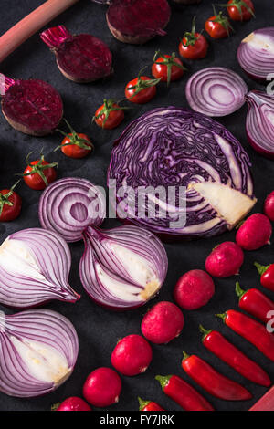 Half red cabbage in dark background. Selective focus on cabbage in ...