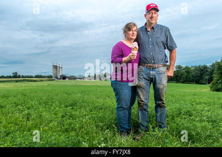 Kate and David Dallam, owners of Broom's Bloom Dairy, with their cows ...