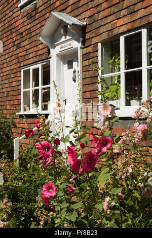 UK, Kent, Tenterden, Bells Lane, attractive small floral gardens of ...