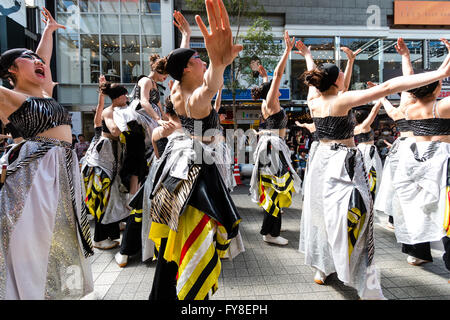Japanese young women dance team in black and white costume formation ...