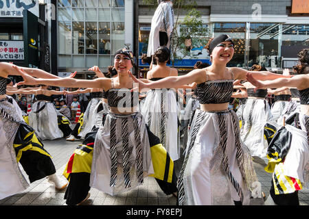 Japanese young women dance team in black and white costume formation ...