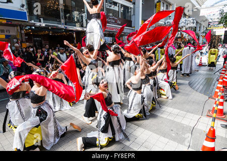 Japanese young women dance team in black and white costume formation ...
