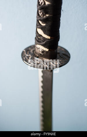 Samurai Sword, blade, guard, and hilt isolated over yellow Stock Photo ...