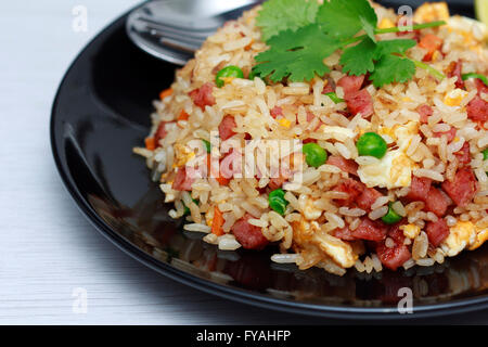 Dice Bacon Fried rice in black dish Stock Photo - Alamy