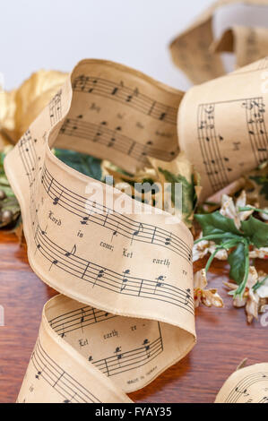 Music note signs and Christmas decorations on table. Banner for design ...