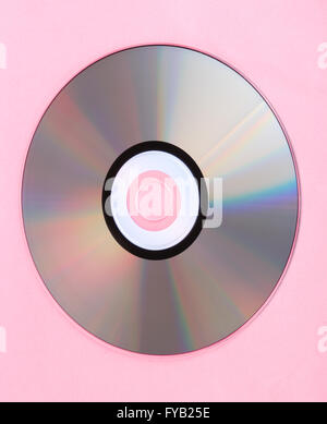 compact disc on pink background Stock Photo - Alamy
