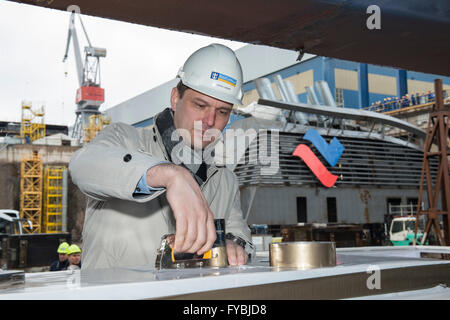 Turku, Finland. 25th Apr, 2016. Project Leader Kim Olin is holding the ...