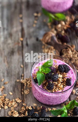 Mulberry smothie with homemade granola copy space background Stock ...