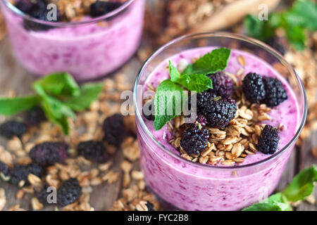Mulberry smothie with homemade granola Stock Photo - Alamy